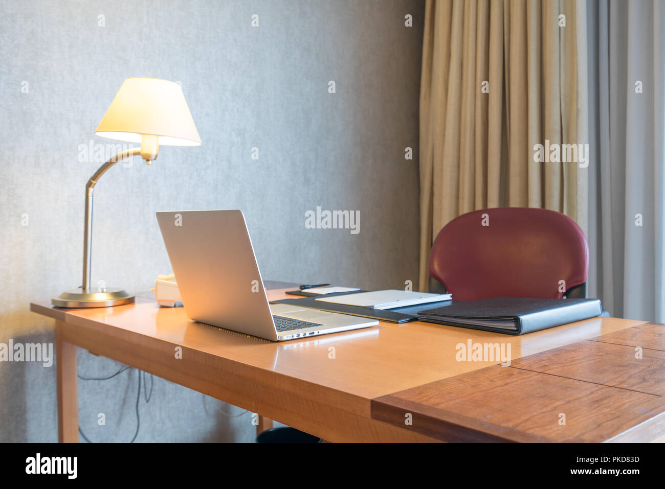 Computer display and office tools on desk in home. Desktop computer ...