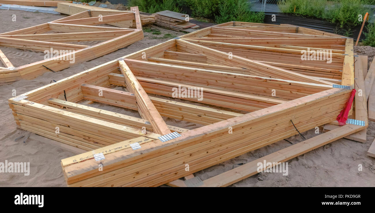Assembled wood segments of a new building pano Stock Photo - Alamy
