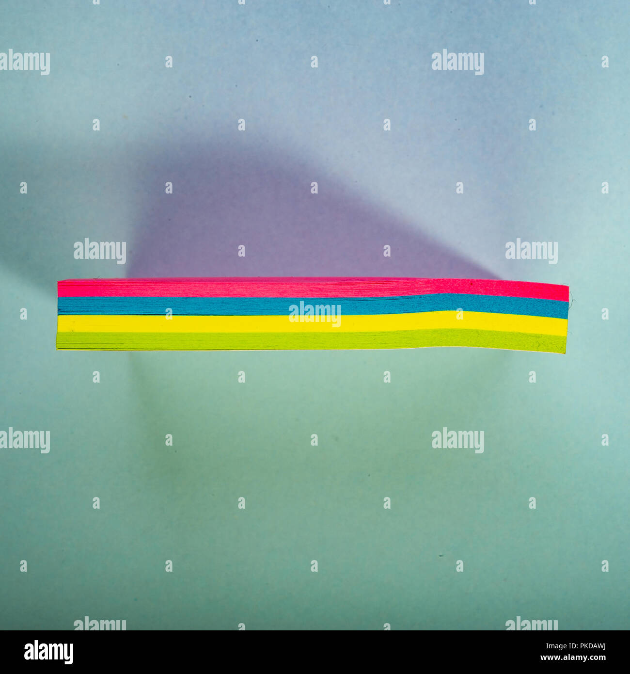 stack of stickers lies on a green background. Design element. Web ...