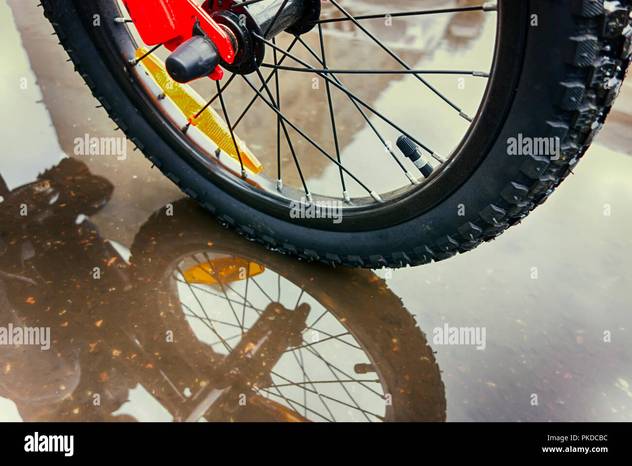 Bike through puddle hi-res stock photography and images - Alamy