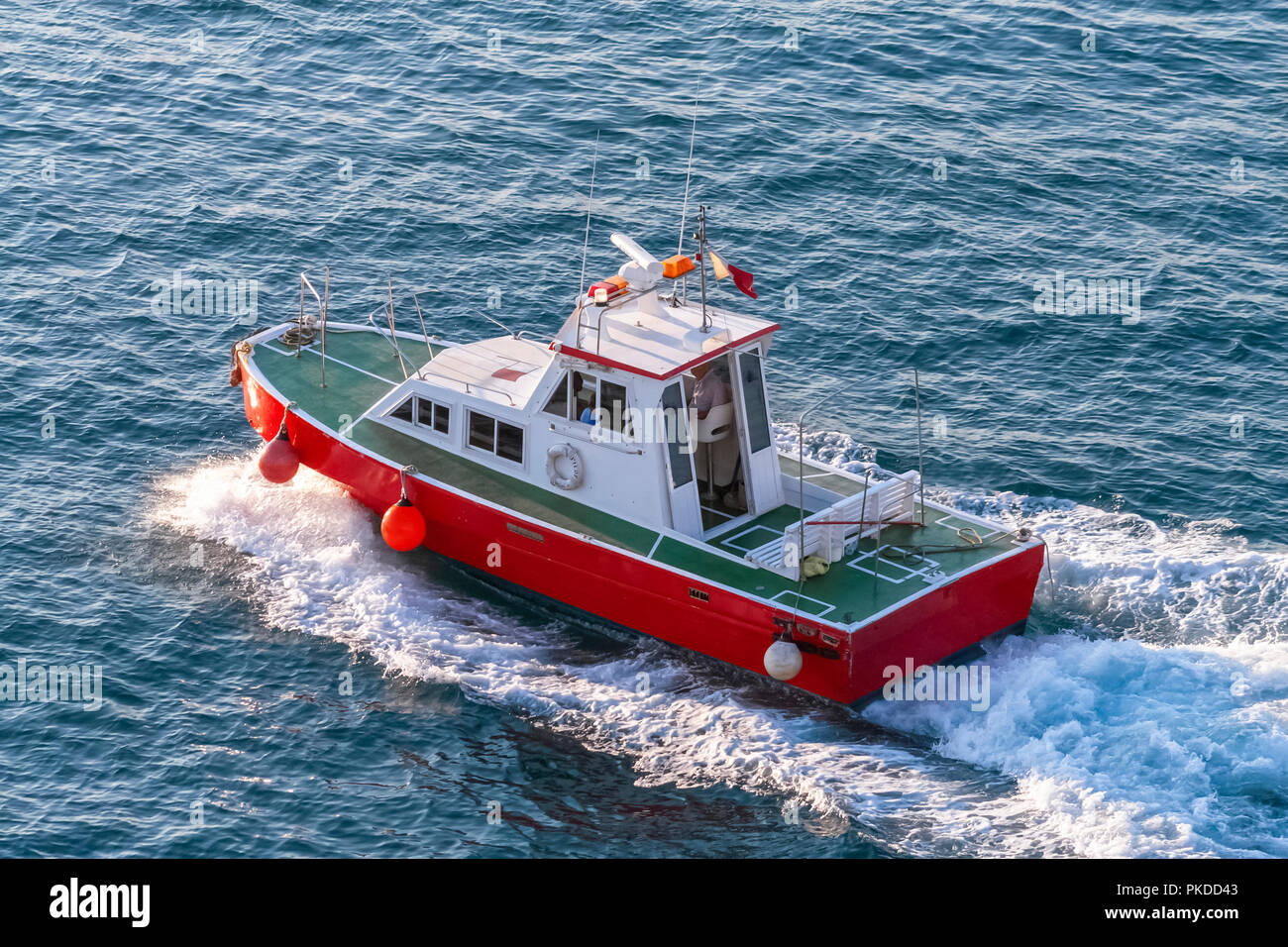 Pilot boat sailing in the coast of Mexico Stock Photo - Alamy