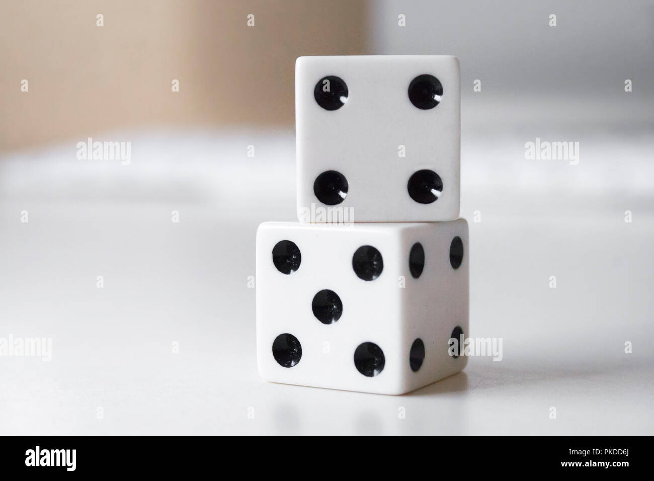 Sitting on dice hi-res stock photography and images - Alamy