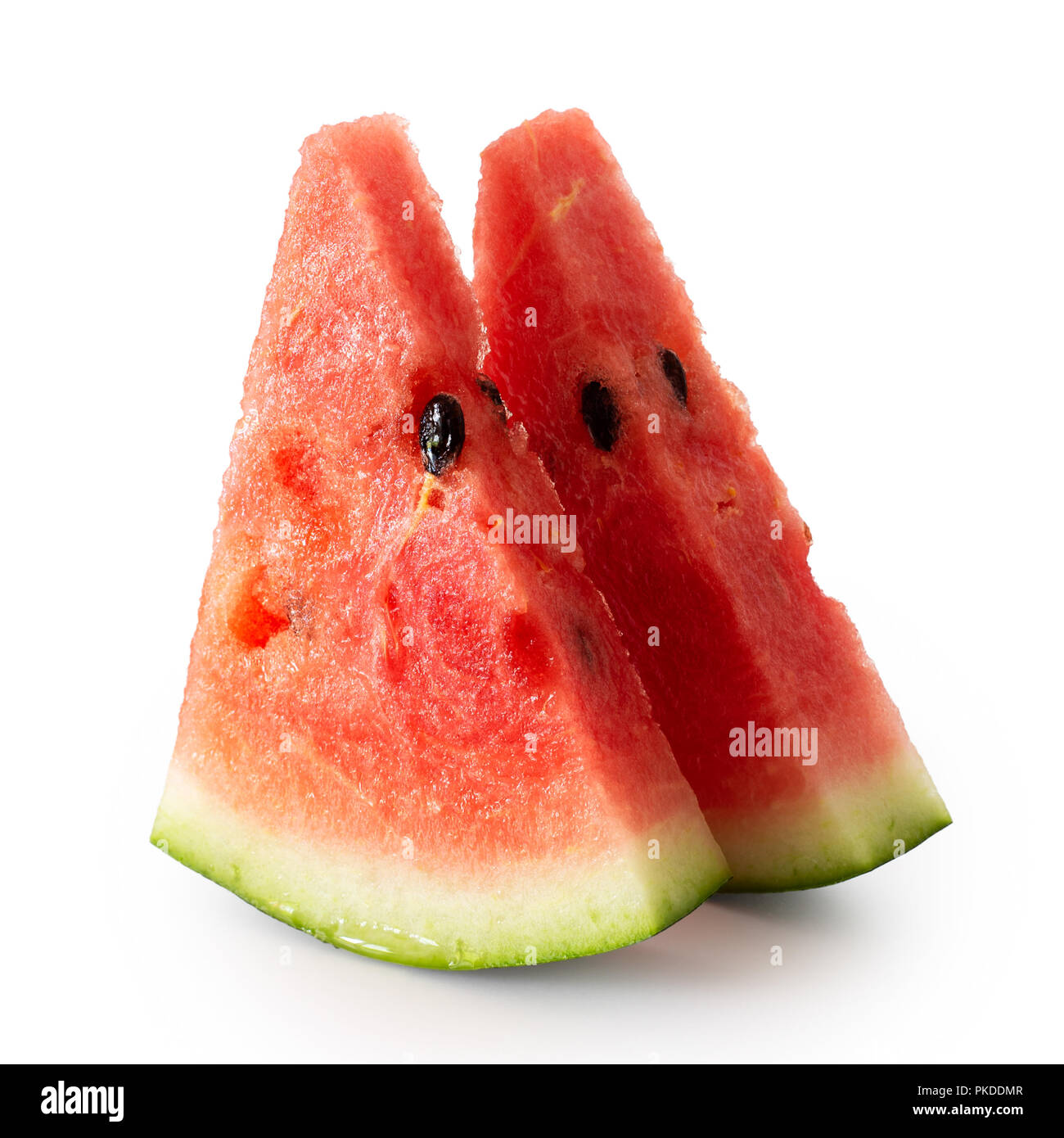 Two standing watermelon triangles with seeds isolated on white Stock ...