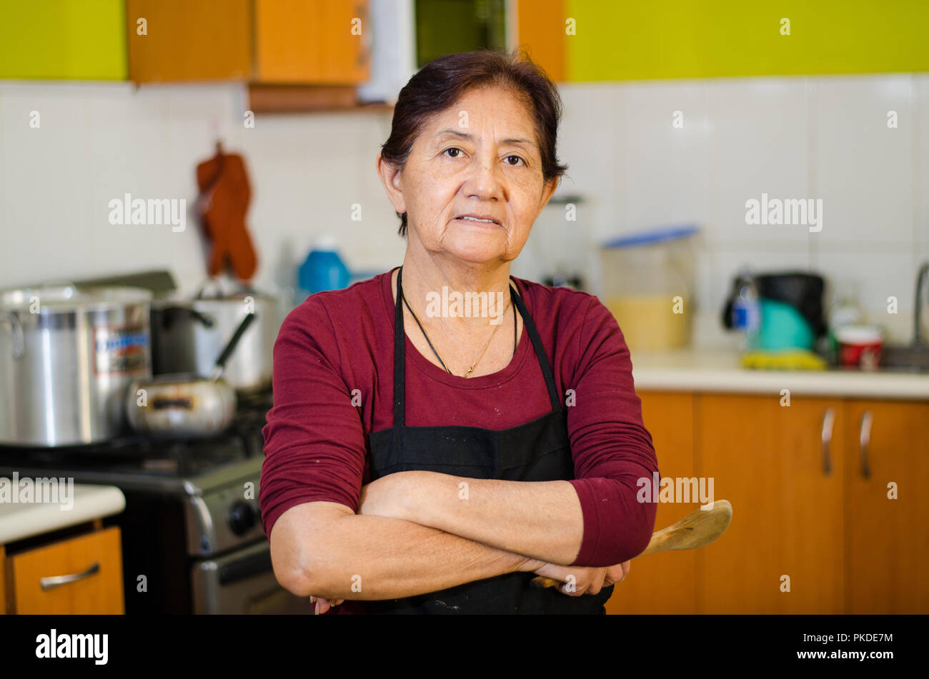 A old lady cooking hi-res stock photography and images - Alamy
