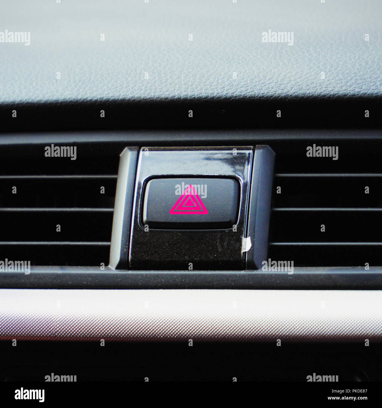 Emergency button on the car panel Stock Photo - Alamy