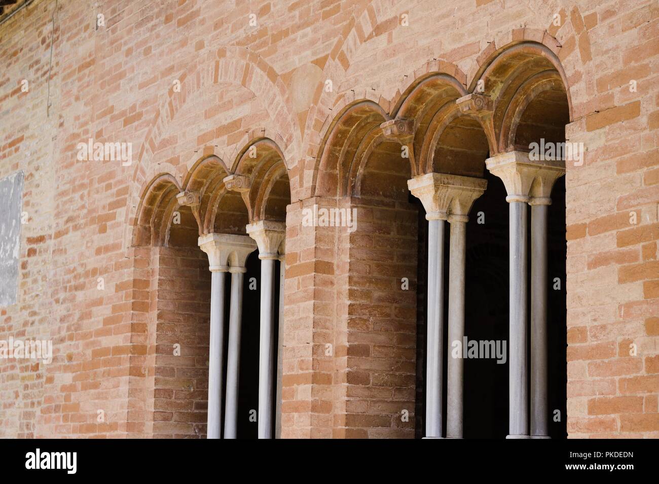 Medieval windows with round arches - Roman style details (Fiastra Abbey ...