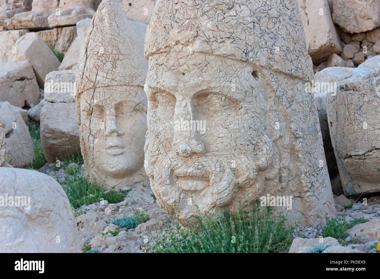 Statue of head at sunrise on the west side of the mountain, Mt. Nemrut ...