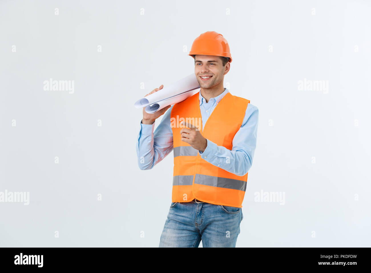 Professional young engineer with blueprint, isolated on white Stock ...