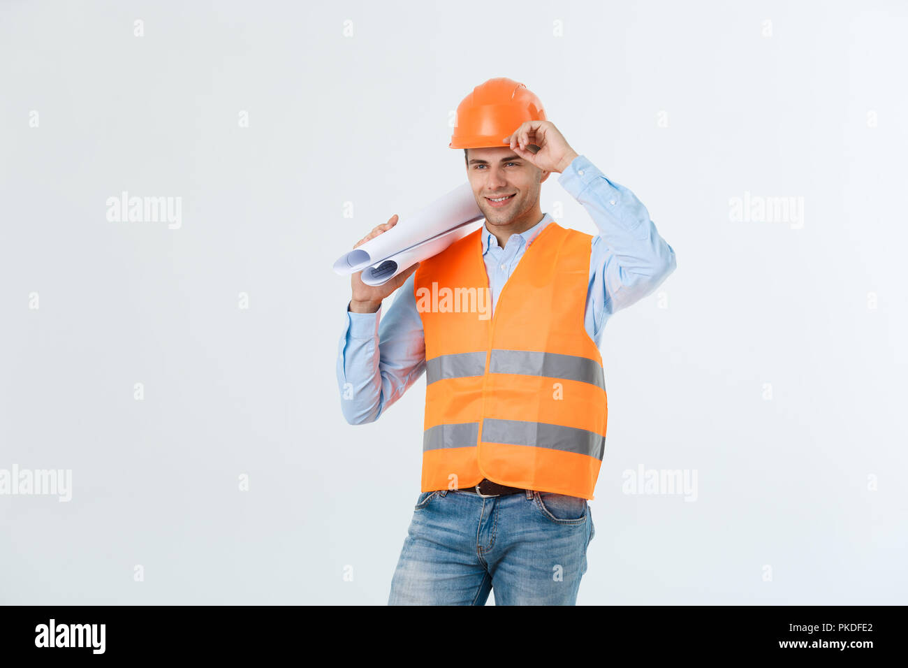 Professional young engineer with blueprint, isolated on white Stock ...
