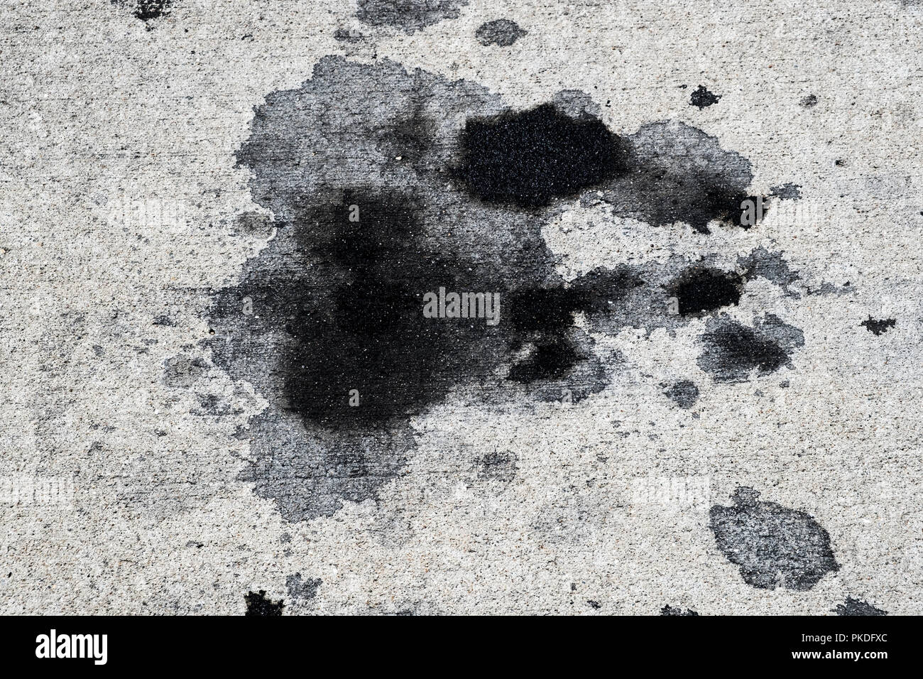 Motor oil stains on concrete pavement/texture background Stock Photo ...