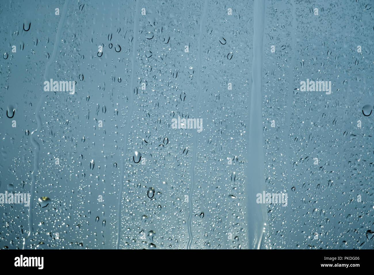 Car windshield covered in raindrops/texture background Stock Photo - Alamy