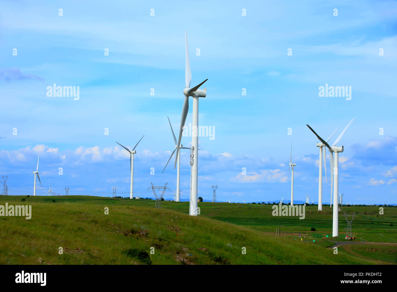 Wind power tower on the grassland Stock Photo - Alamy