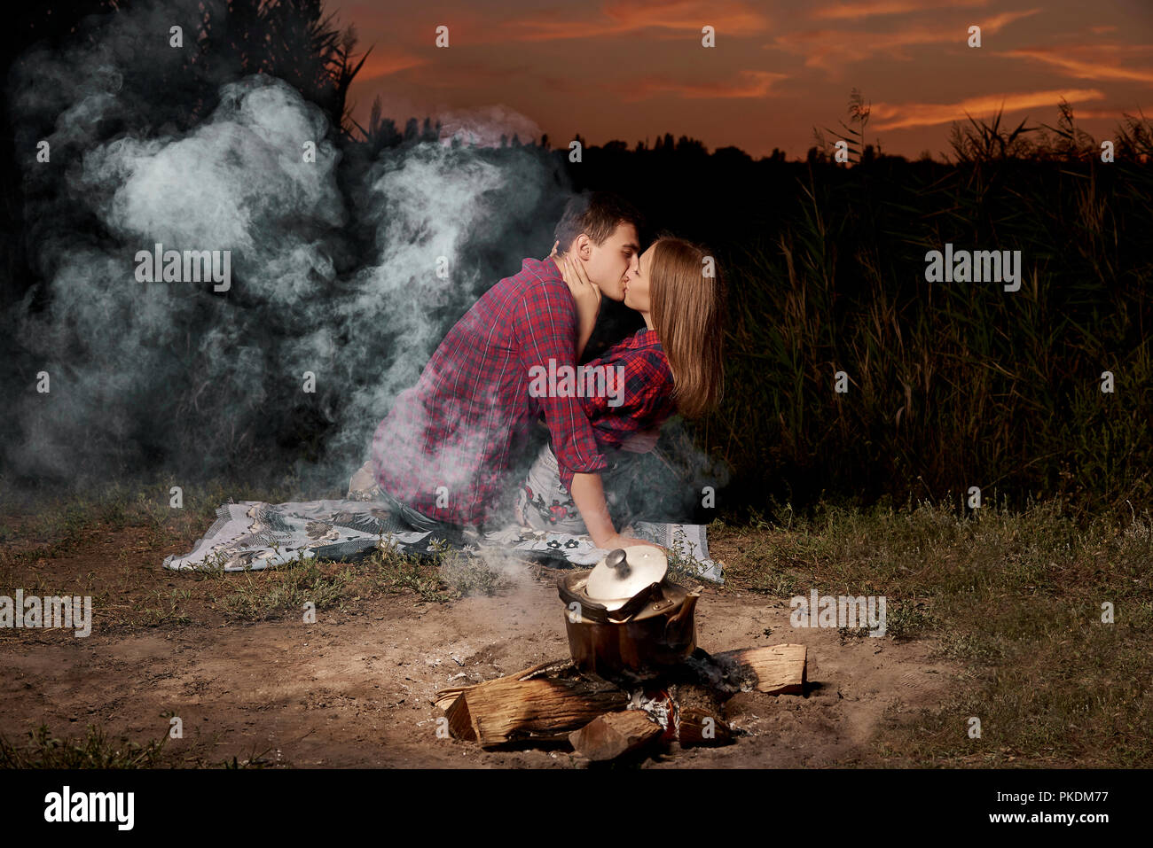 Couple kissing fire hi-res stock photography and images - Alamy