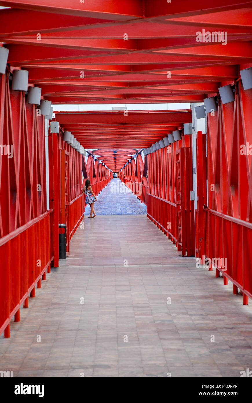 Red iron pedestrian walkway Stock Photo - Alamy