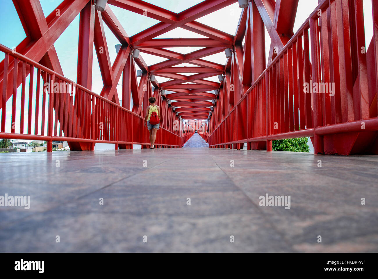 Red iron pedestrian walkway Stock Photo - Alamy