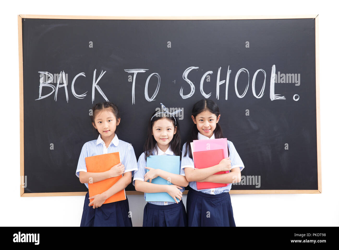 Cute little girls in the classroom Stock Photo - Alamy