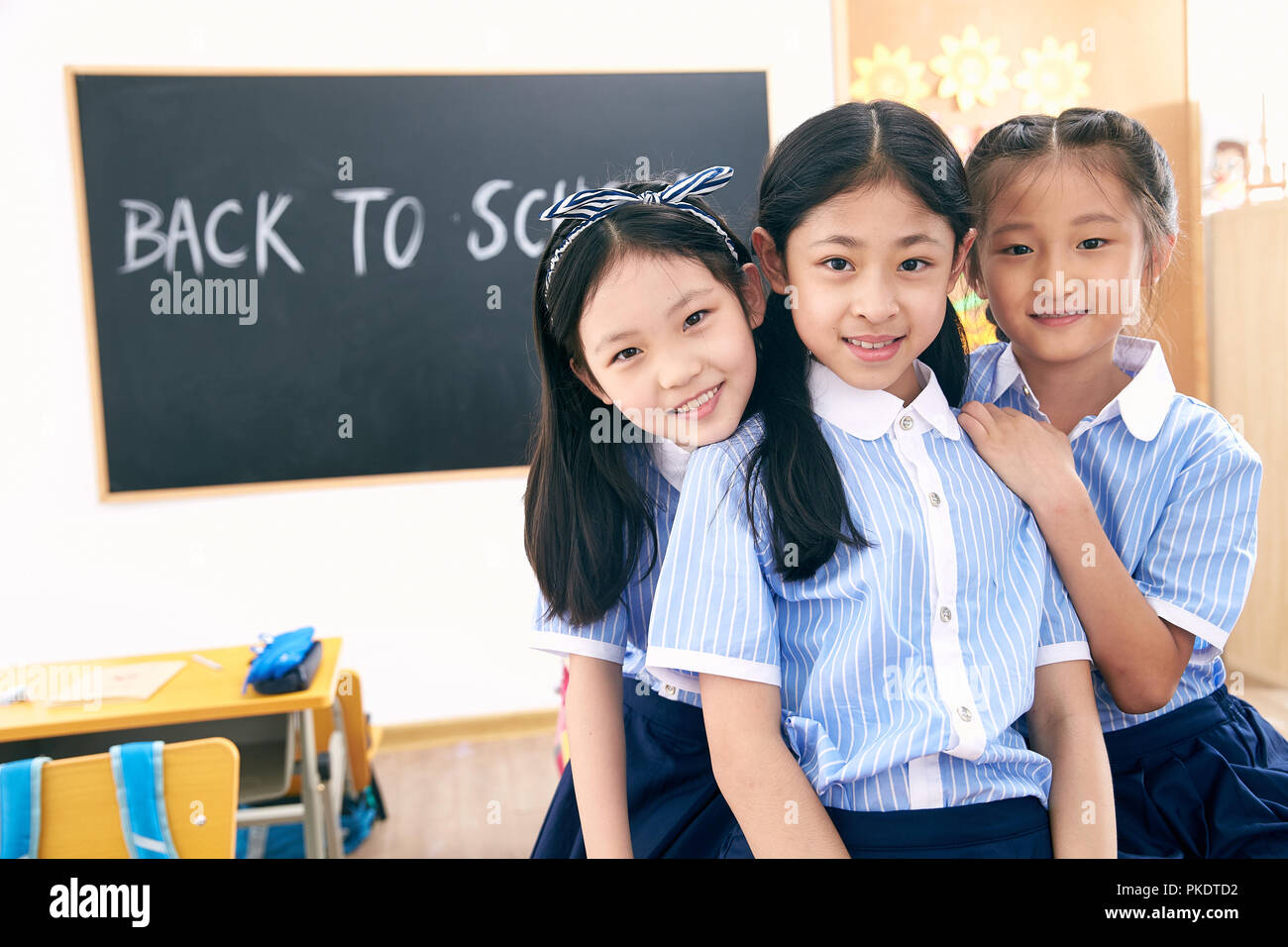 Cute little girls in the classroom Stock Photo - Alamy