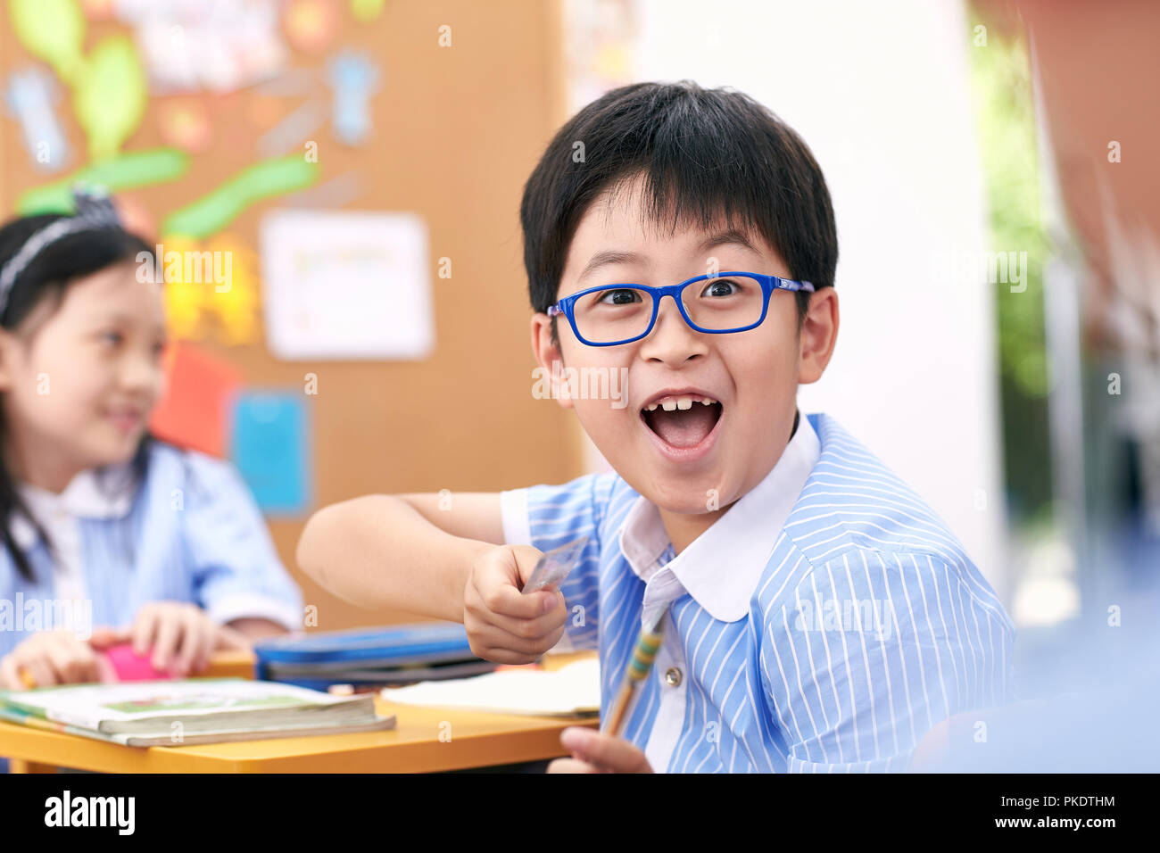 Two Chinese School Boys Studying High Resolution Stock Photography and ...