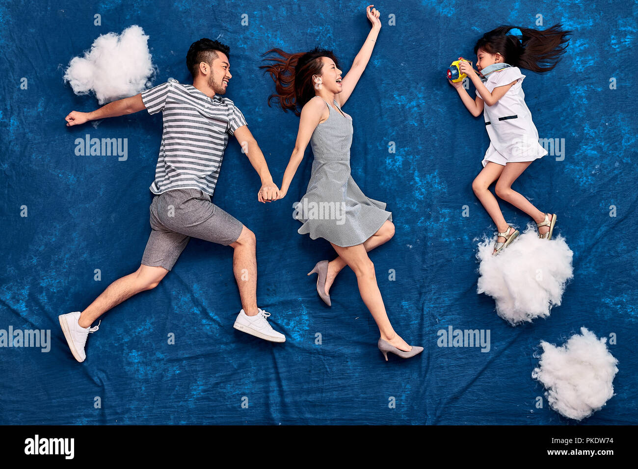 Three happy play Stock Photo - Alamy