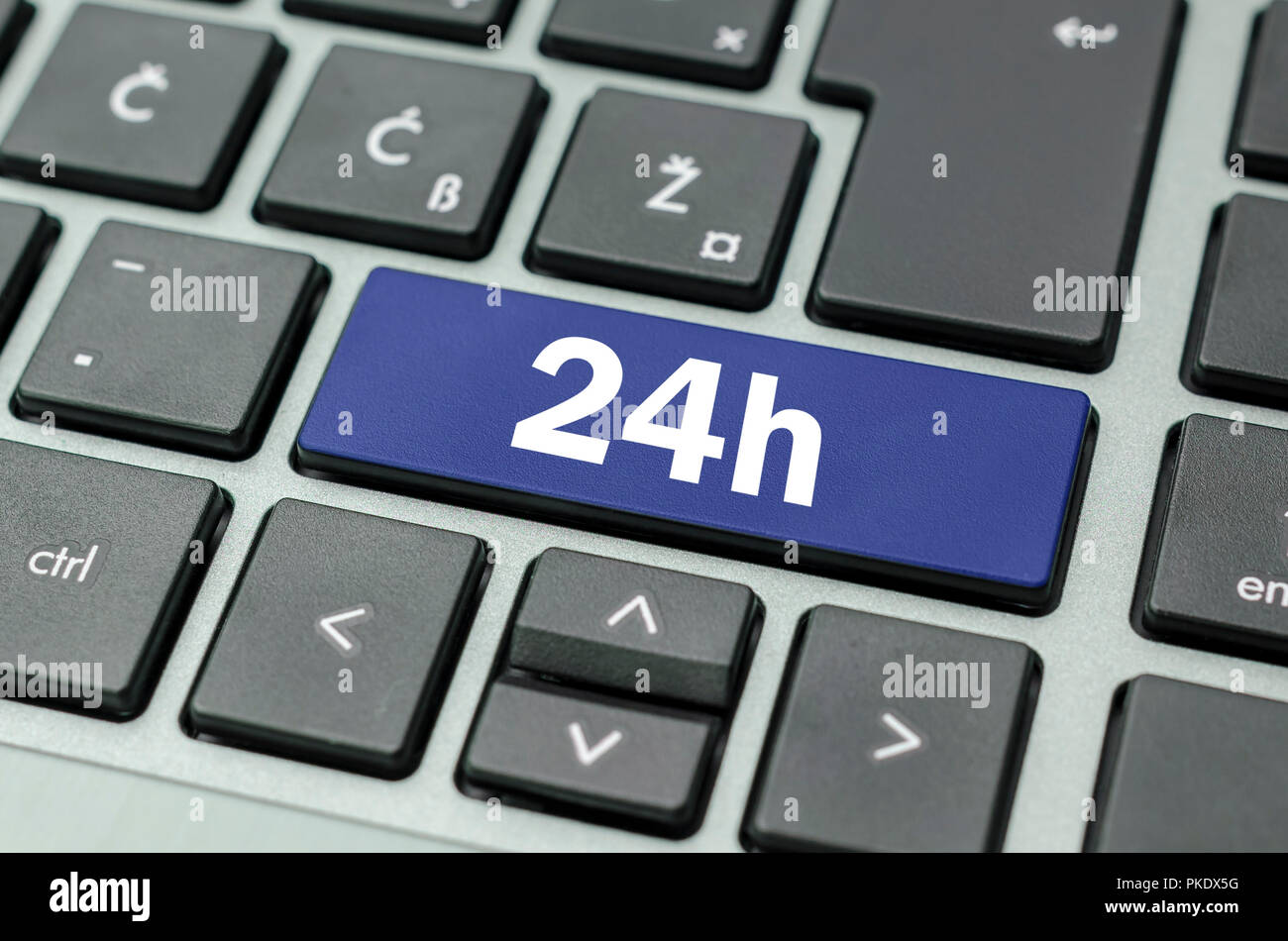 24h computer button Stock Photo - Alamy