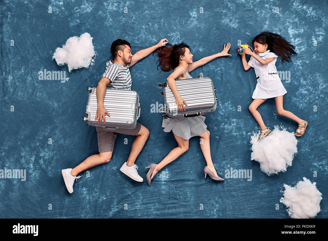 Three happy play Stock Photo - Alamy