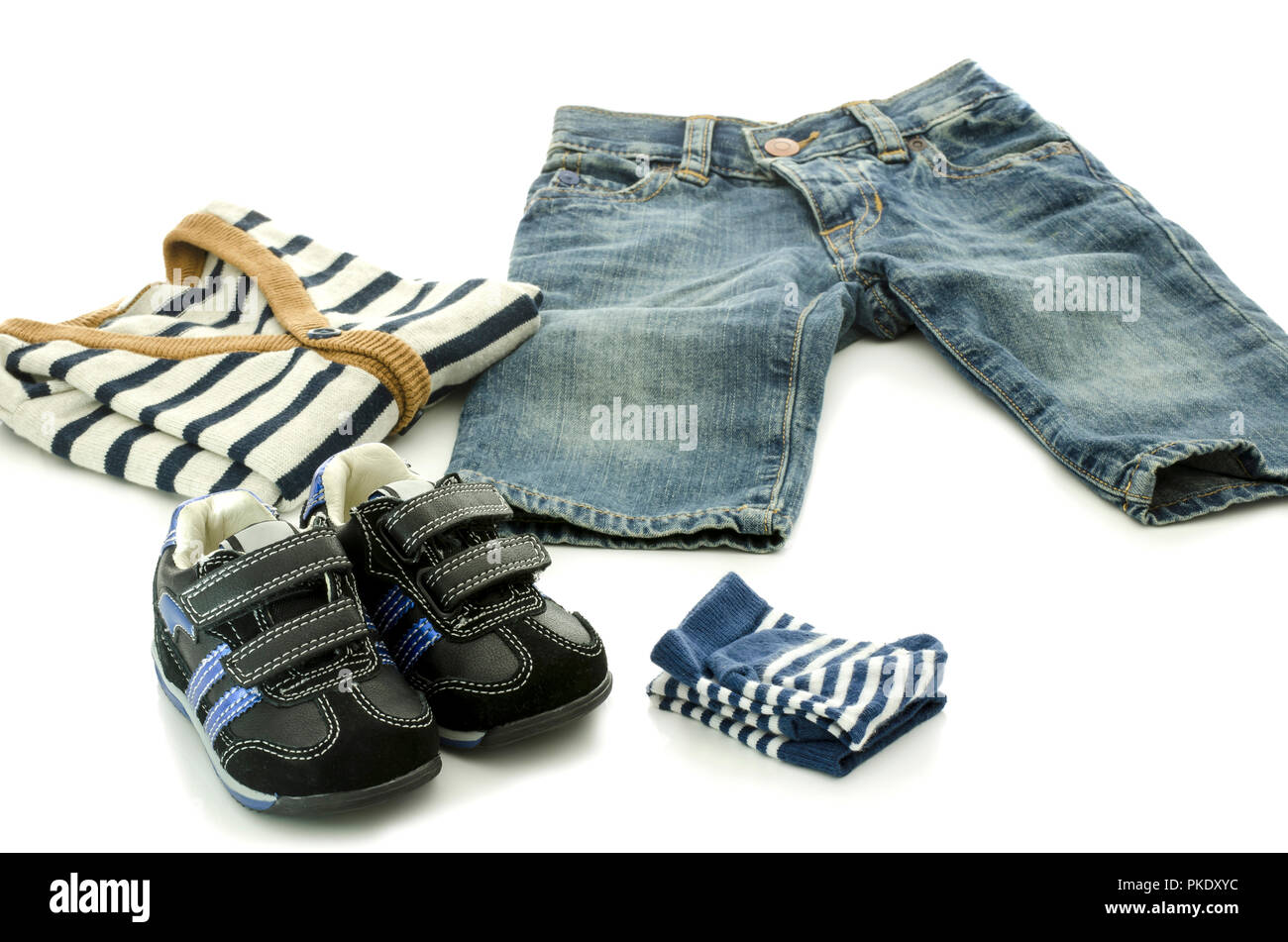 Prepared clothes for a baby boy isolated on a white background Stock ...