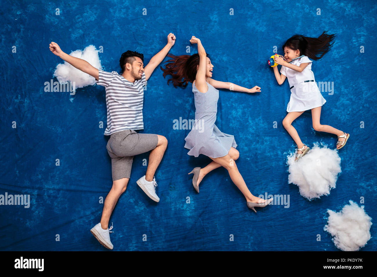 Three happy play Stock Photo - Alamy