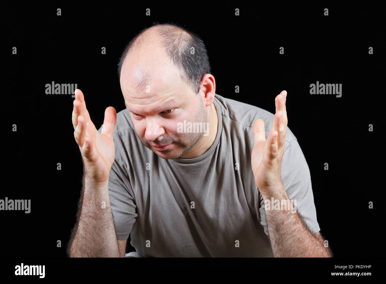 Devastated man worrying about hair loss problem Stock Photo - Alamy