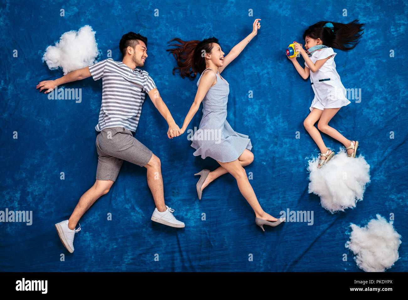 Three happy play Stock Photo - Alamy