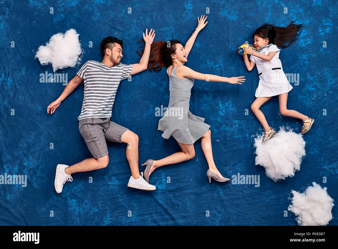 Three happy play Stock Photo - Alamy