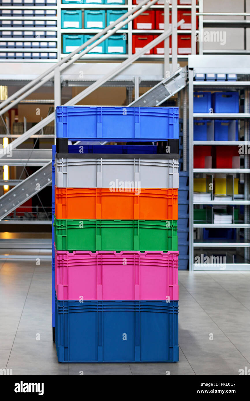 Colourful plastic crates and boxes for delivery Stock Photo - Alamy