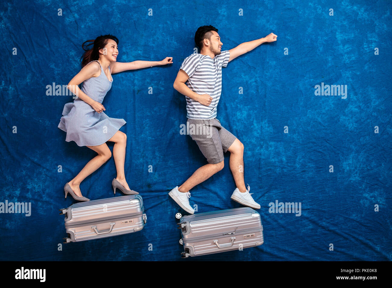 Happy couples fly in the sky Stock Photo - Alamy