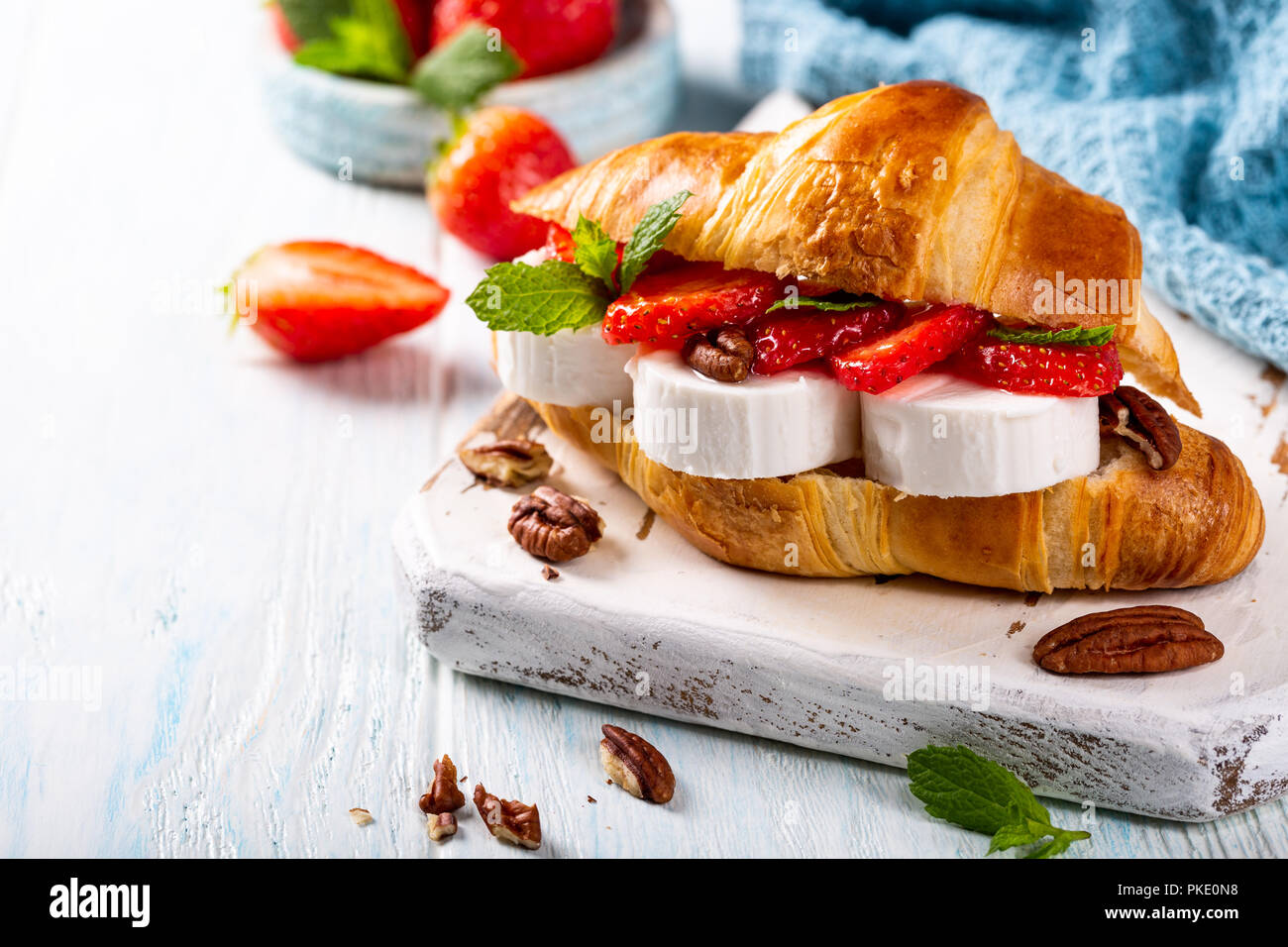 Sandwich croissant with goat cheese Stock Photo - Alamy
