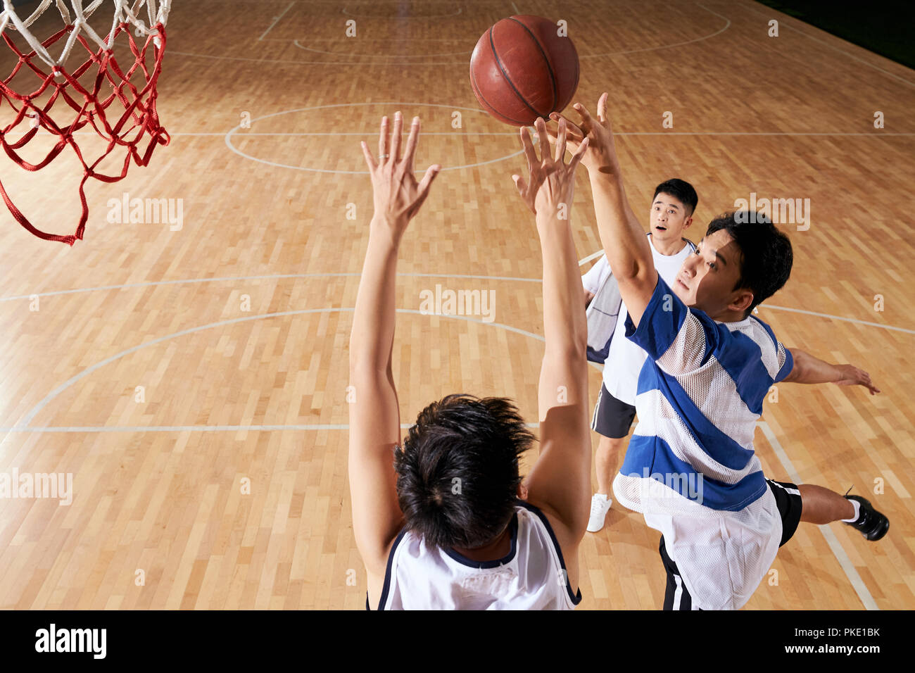 Young men to play basketball Stock Photo - Alamy