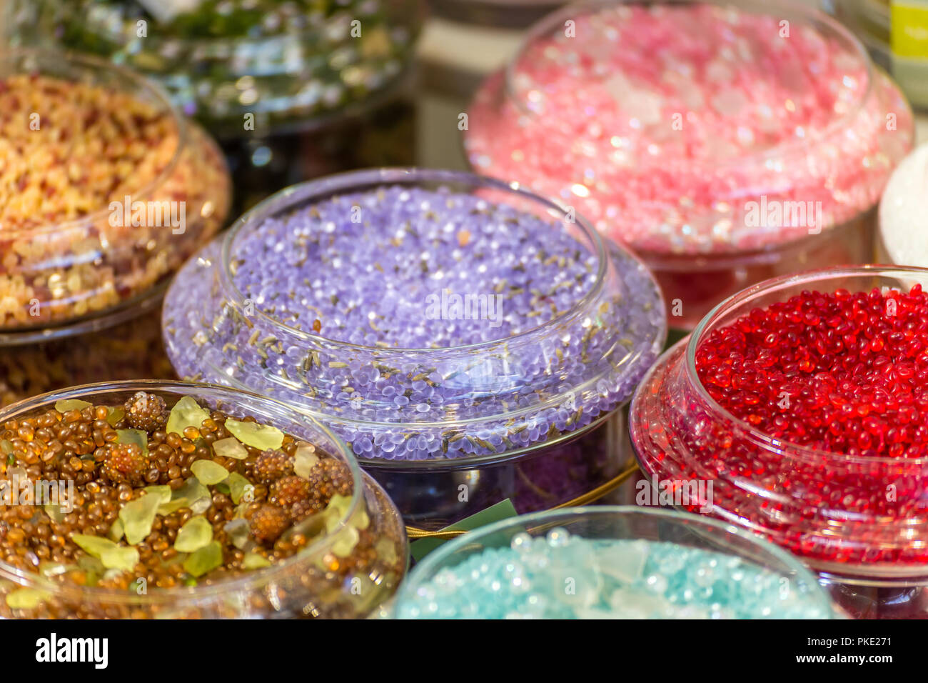 colorful quartz in glass jars Stock Photo - Alamy