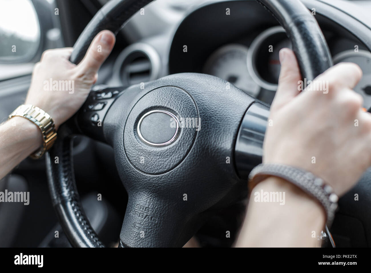 Hands on the steering wheel hi-res stock photography and images - Alamy