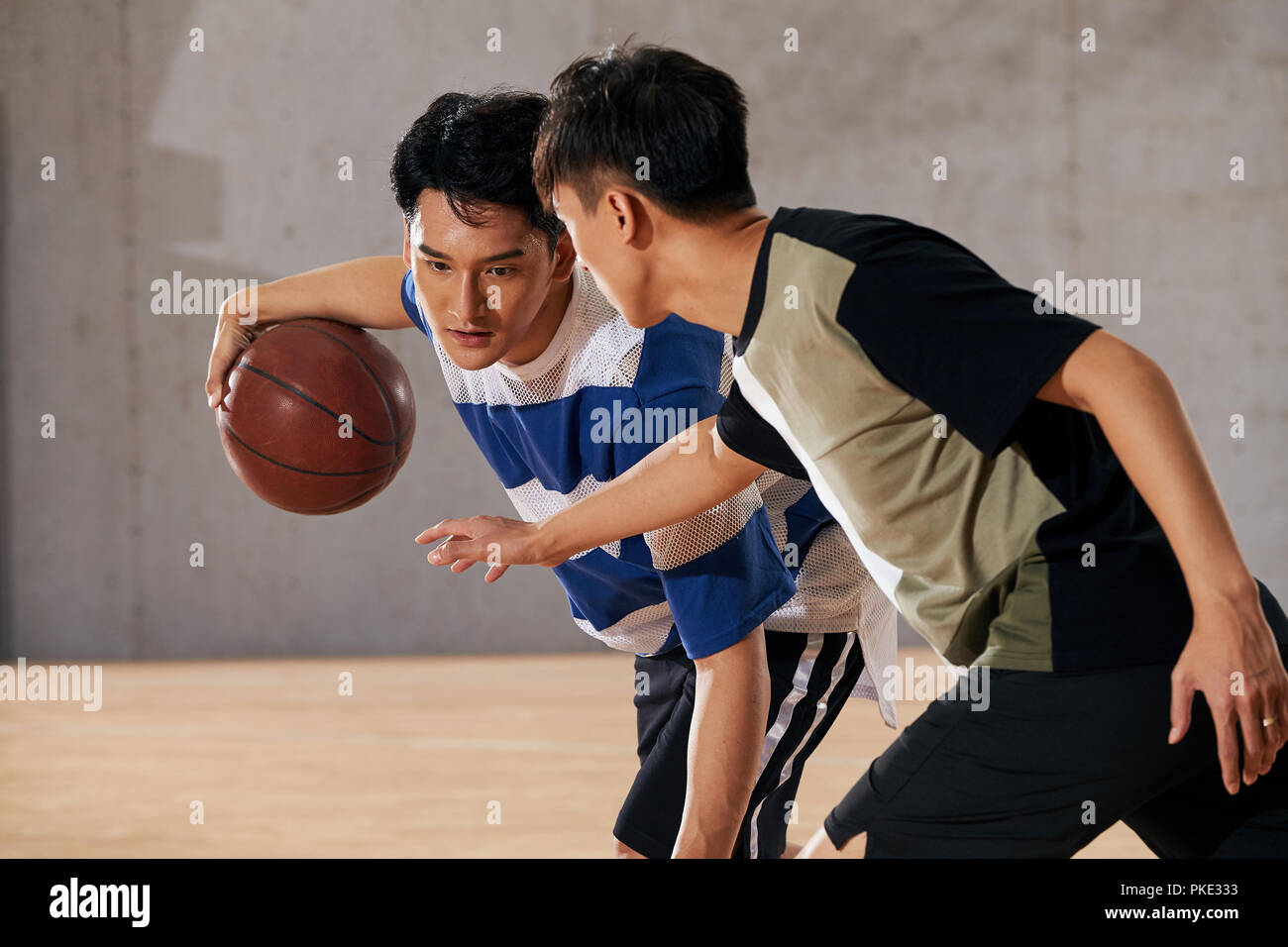 Two males with basketball hi-res stock photography and images - Alamy