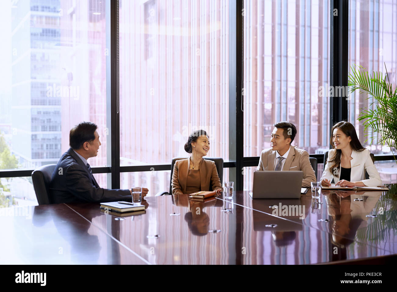 Business men and women in the conference room Stock Photo - Alamy