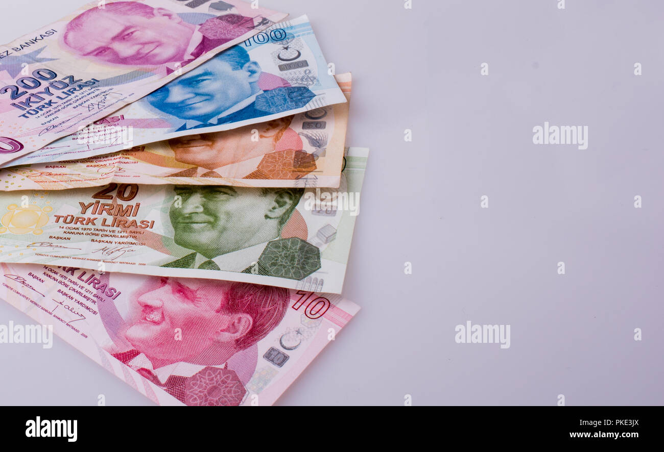 American dollar banknotes and Turksh Lira banknotes side by side on ...