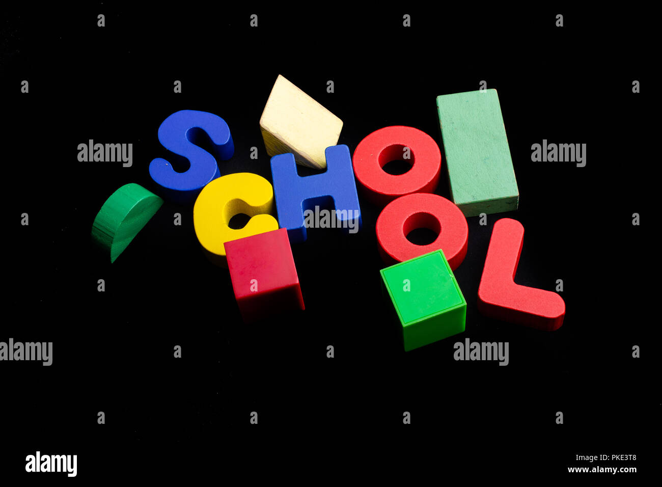 Education concept by School lettering with colorful wooden letters ...