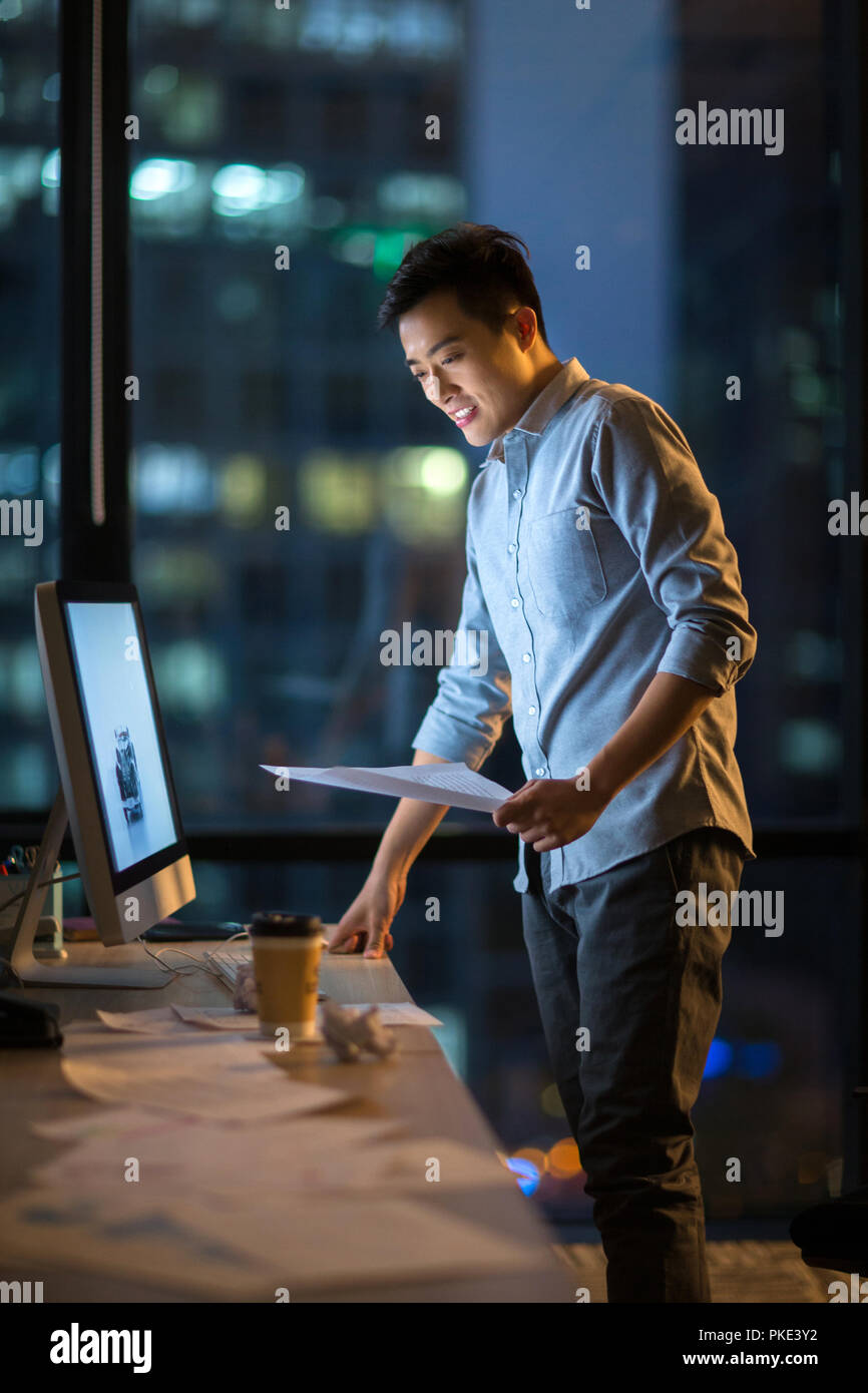 Business men in the office to work overtime Stock Photo - Alamy