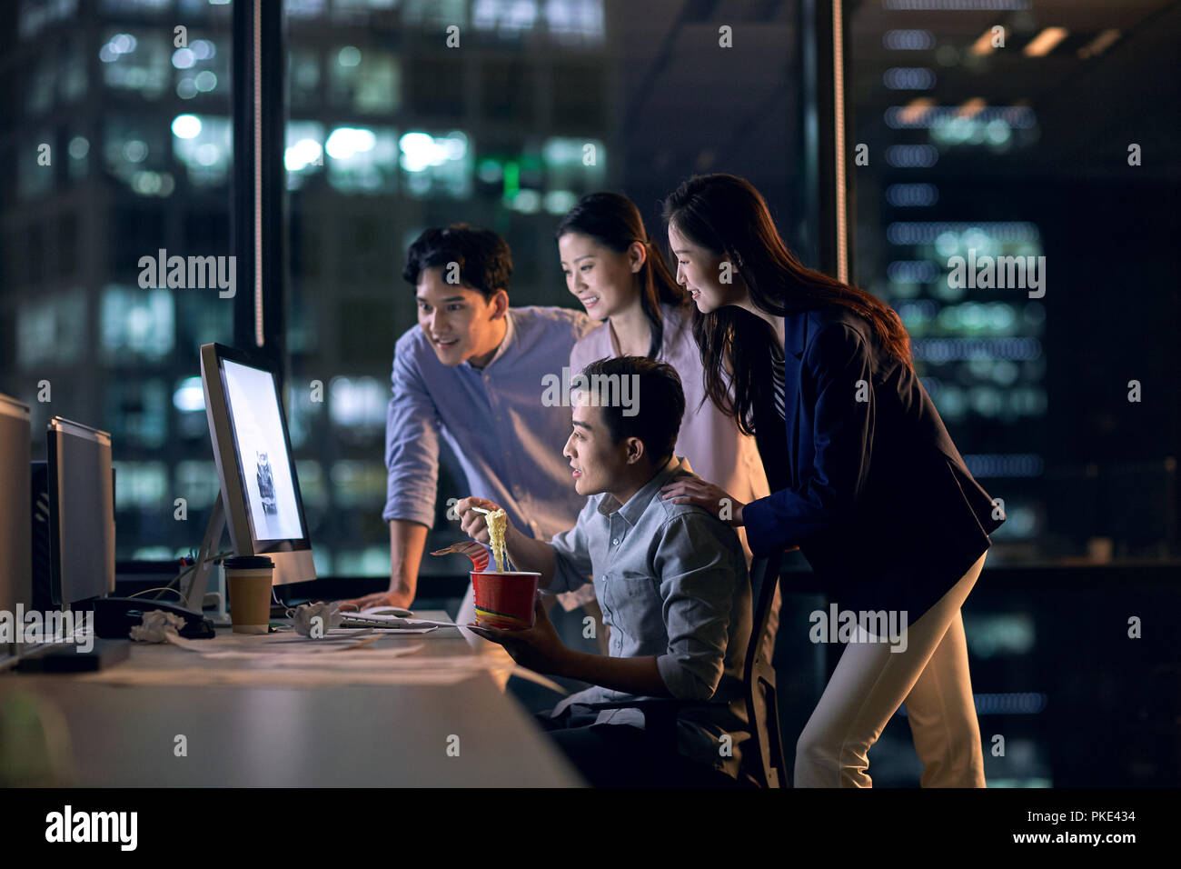 Business team to work overtime at the office Stock Photo - Alamy
