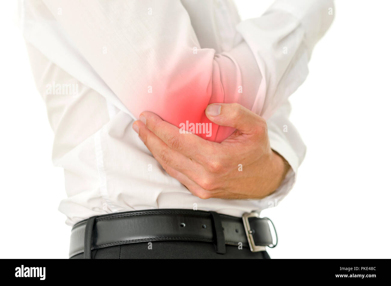 Closeup of man in suit holding his painful injured elbow. Red spot ...