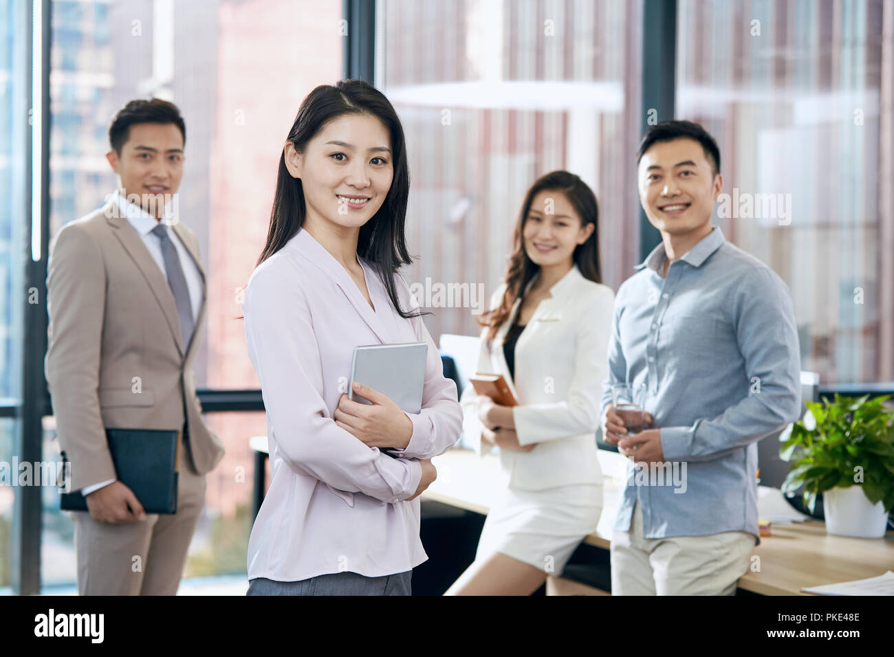 Business team in the office Stock Photo - Alamy
