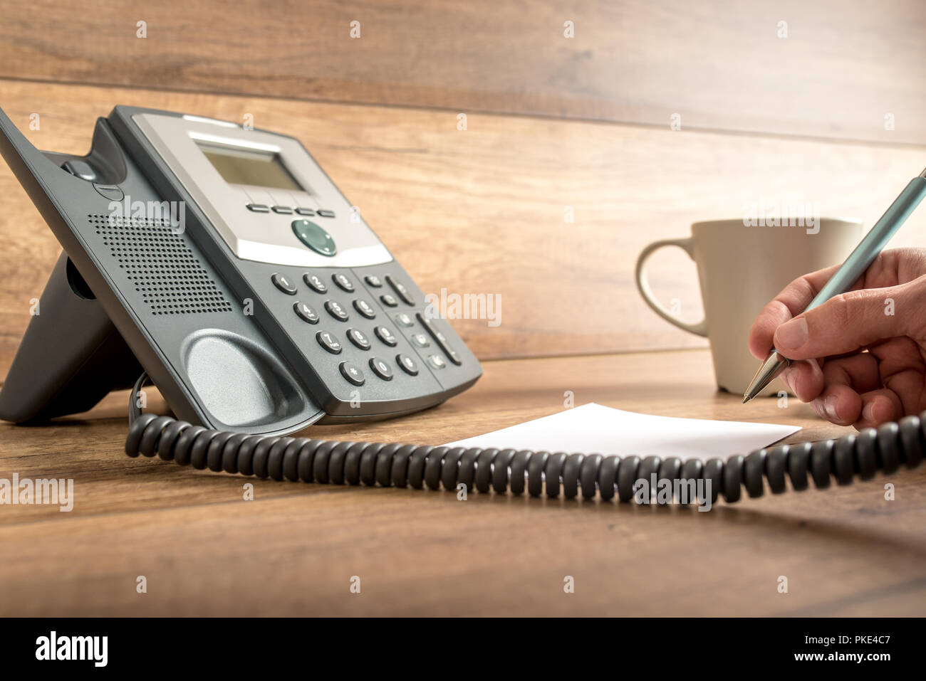 Male receptionist notes hi-res stock photography and images - Alamy