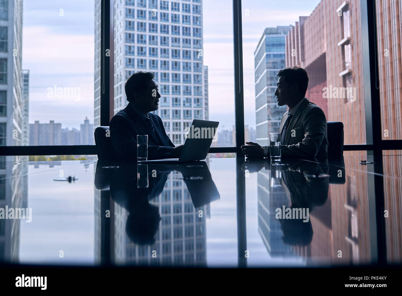Business men in the conference room Stock Photo - Alamy