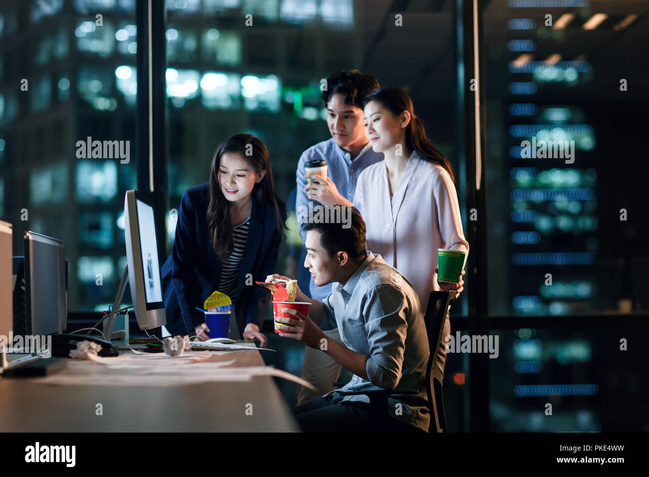 Business team to work overtime at the office Stock Photo - Alamy