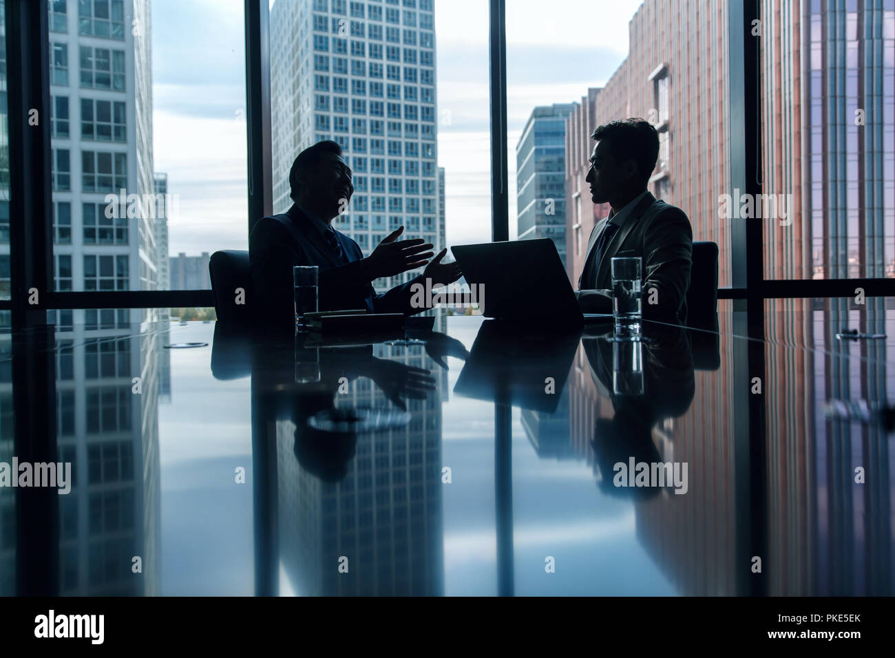 Business men in the conference room Stock Photo - Alamy