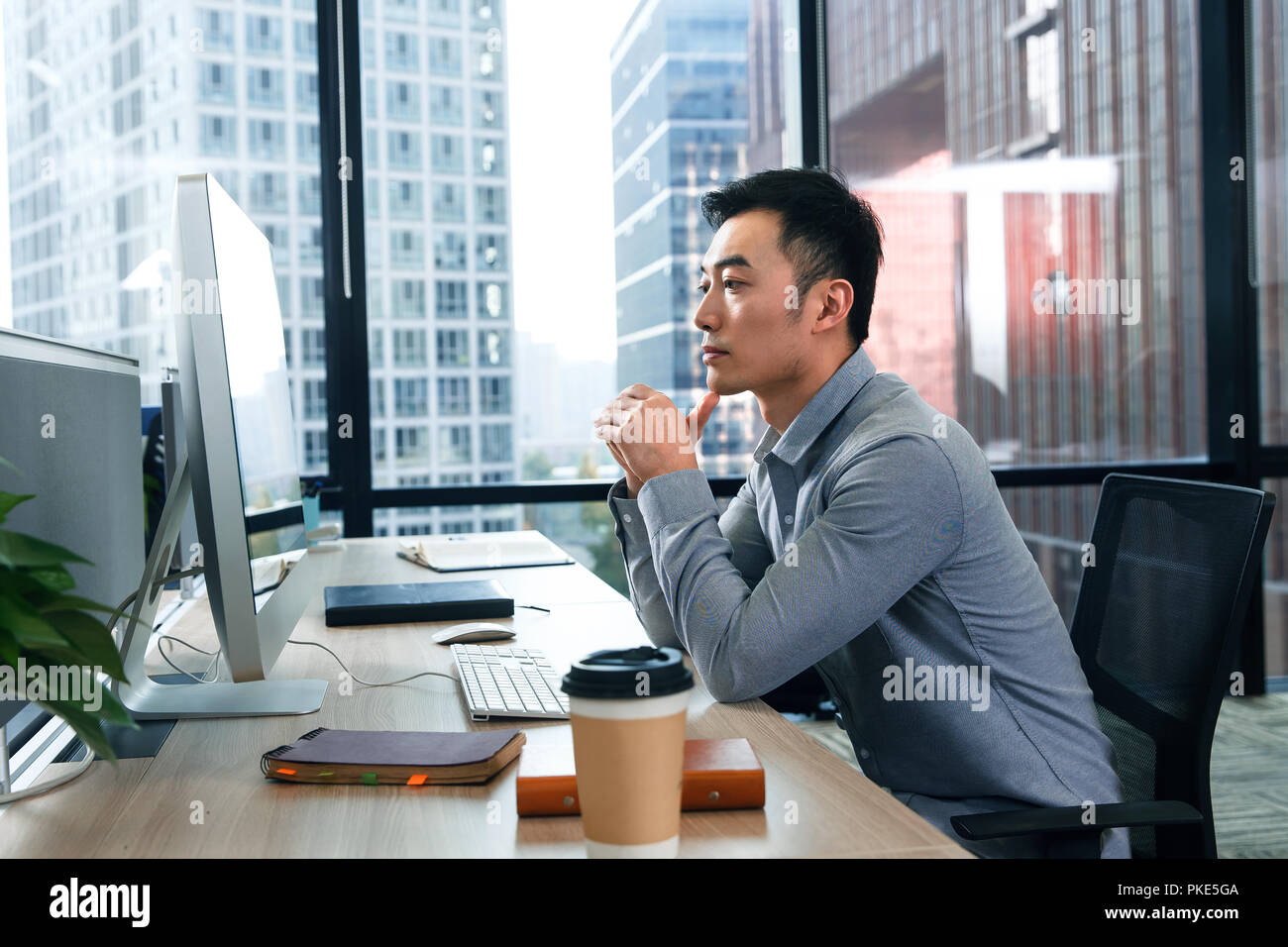 Business men in the office Stock Photo - Alamy