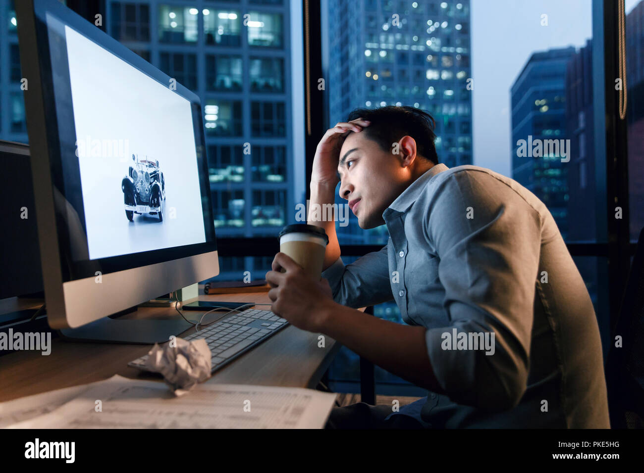 Business men in the office to work overtime Stock Photo - Alamy